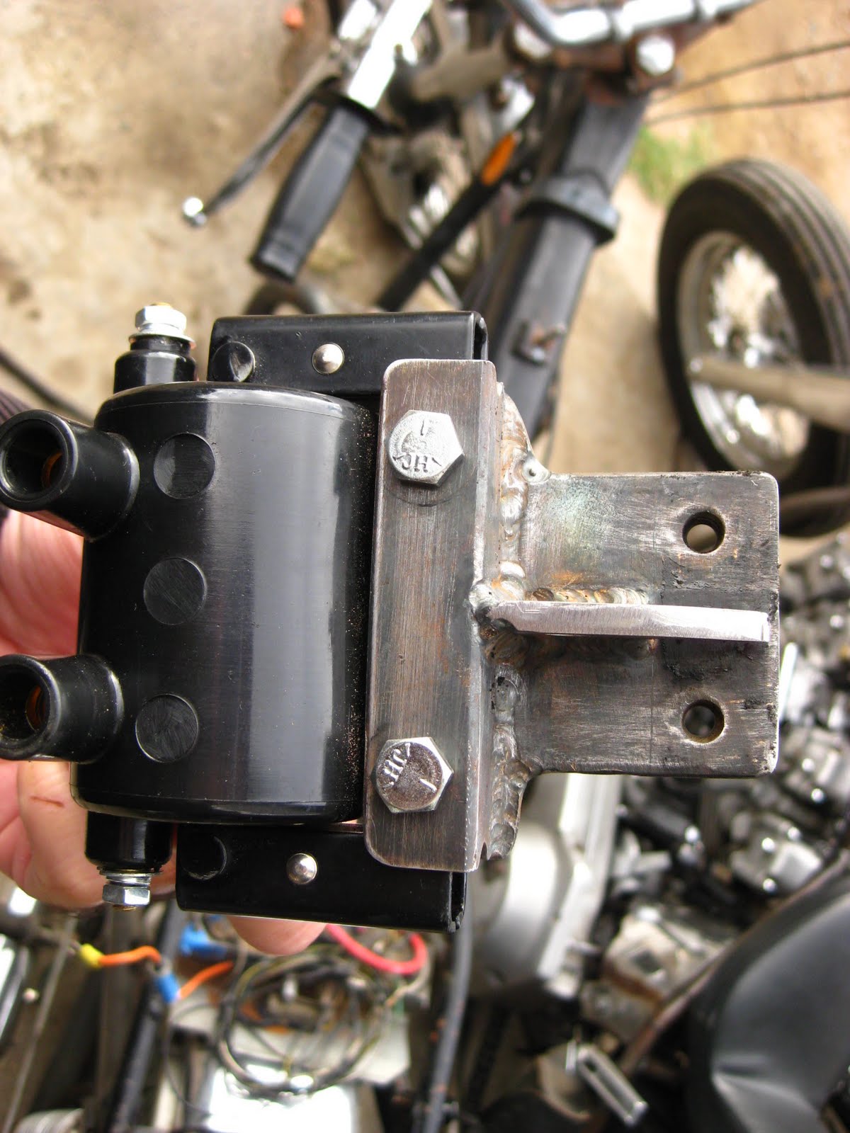 thatcher: triumph coil mount