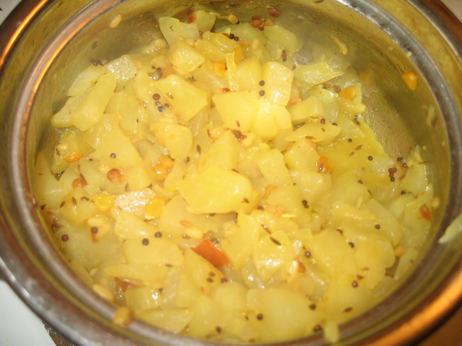 SUMADHURA: Yellow Cucumber with Mustard Paste/Dosakaya Aava Pettina Kura