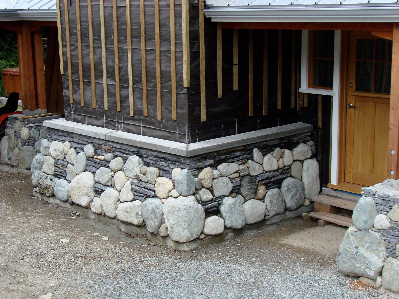 Cam & Karen's house on Dale Place: Installing Concrete Rock Wall Caps