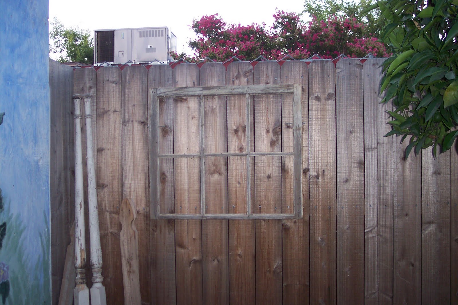 cottage romance: shutters, a window and a dresser...