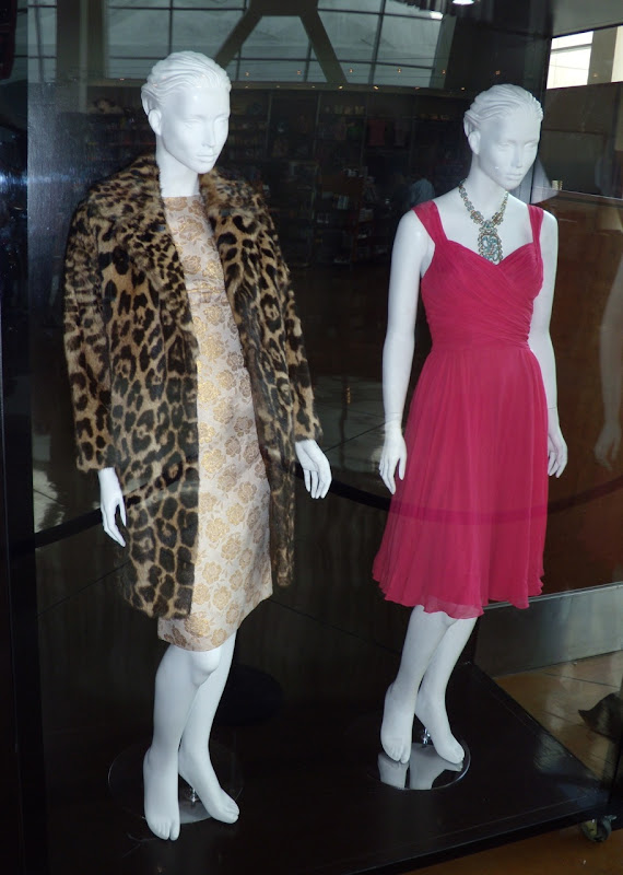 Hollywood Movie Costumes and Props: Outfits worn by Rosamund Pike and ...