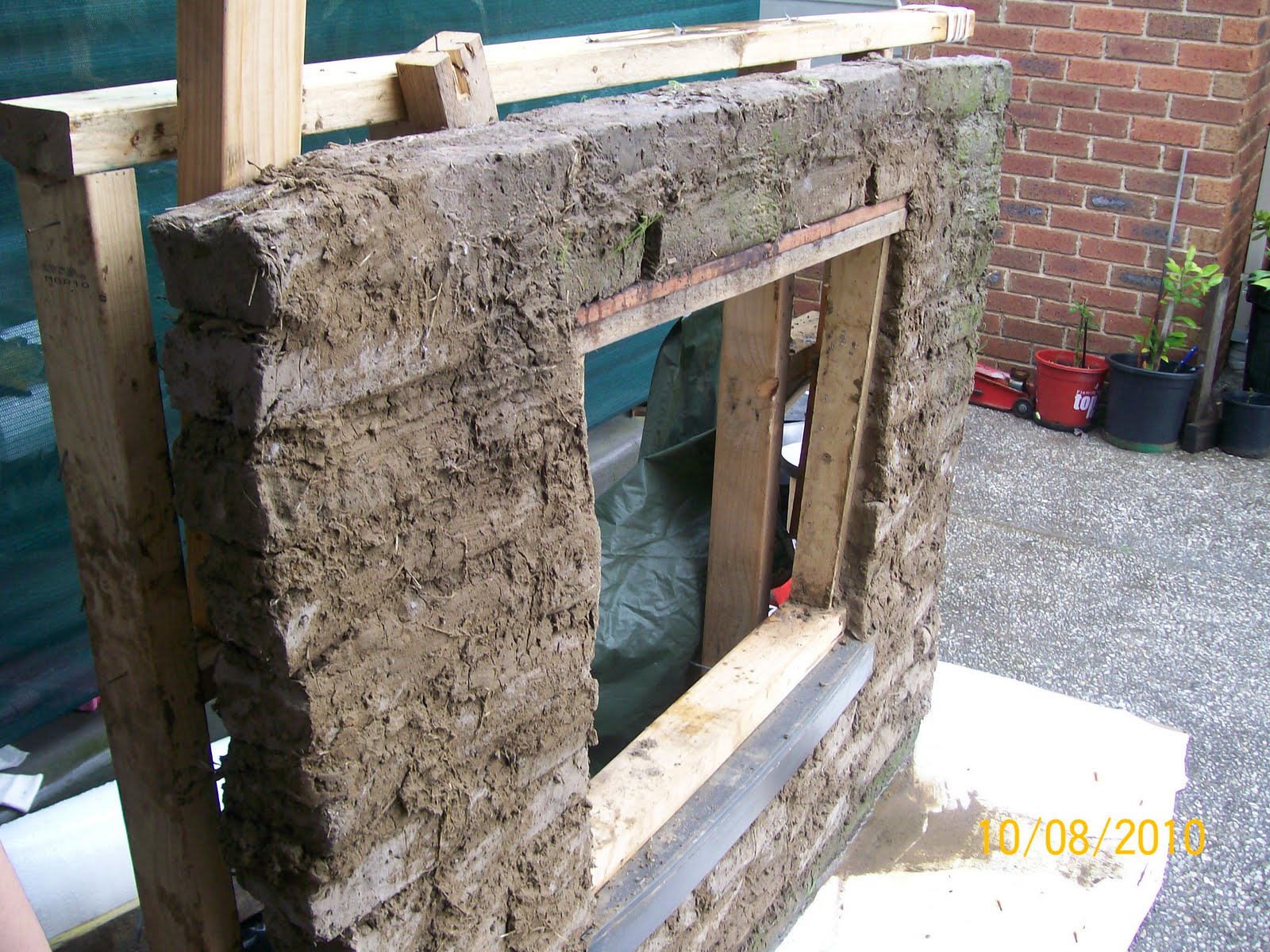 Building A Wall From Mud Bricks (Adobe)