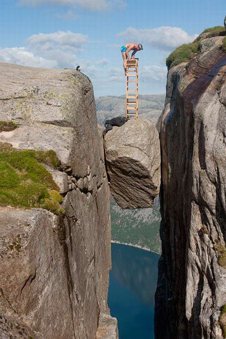 Balancing on the Edge of a Cliff Crazy Stunts - Oddpedia.com
