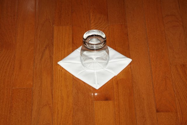 DigiCrumbs: How To Fold A Napkin Rose to set under a Beverage Pitcher