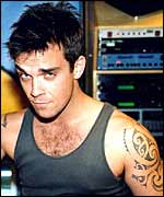 Tattoo Styles For Men and Women: Robbie Williams Tattoos