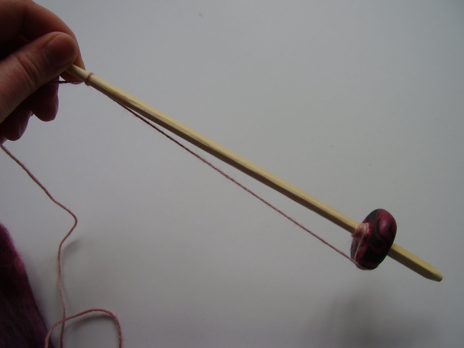 Making spindles with chopsticks & fimo.