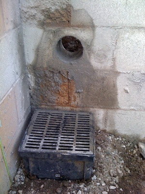 ALR: Catch basin for roof drain.