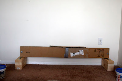 Assembling a Molecular Architecture: Laminated Corrugated Cardboard Beam