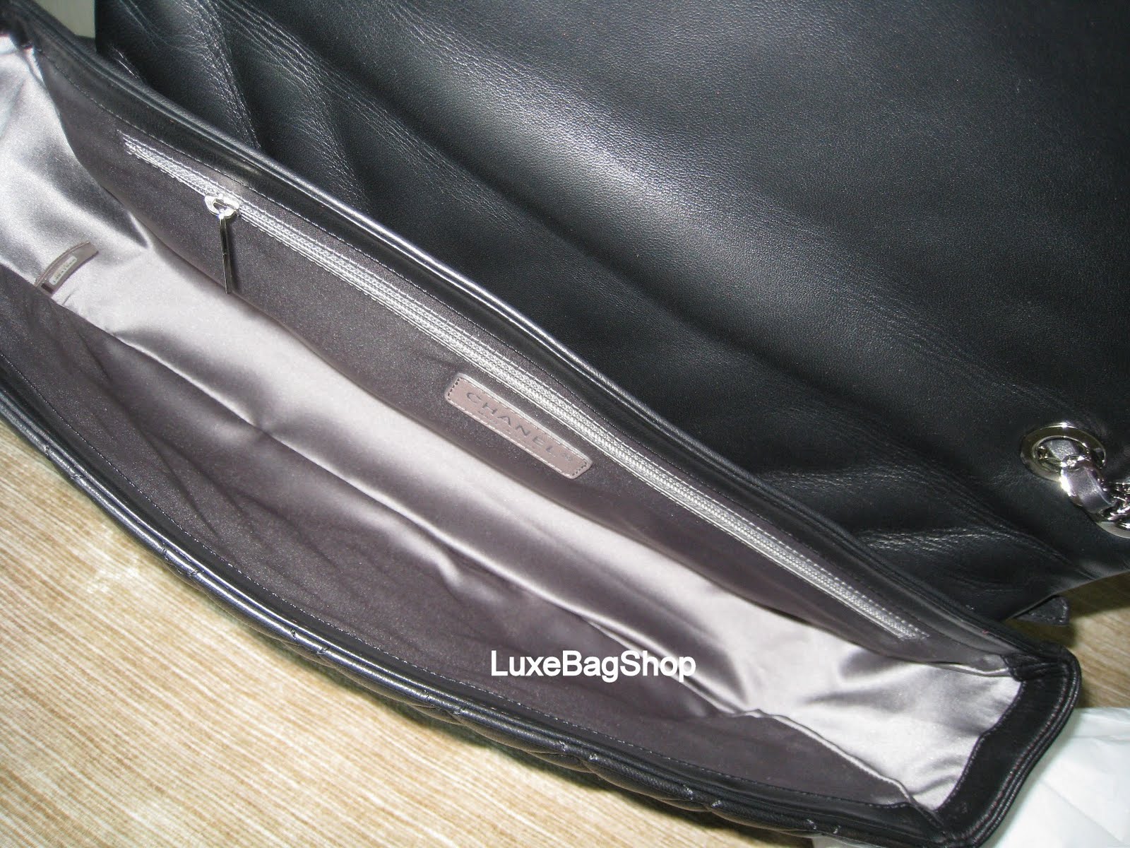 LuxeBagShop: Chanel Classic Flap with Rain Cover - Sold