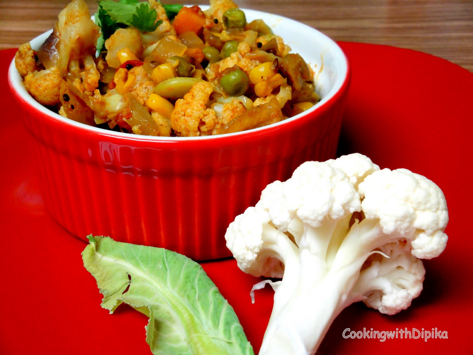 Cooking with Dipika: Cauliflower curry with colorful toppings