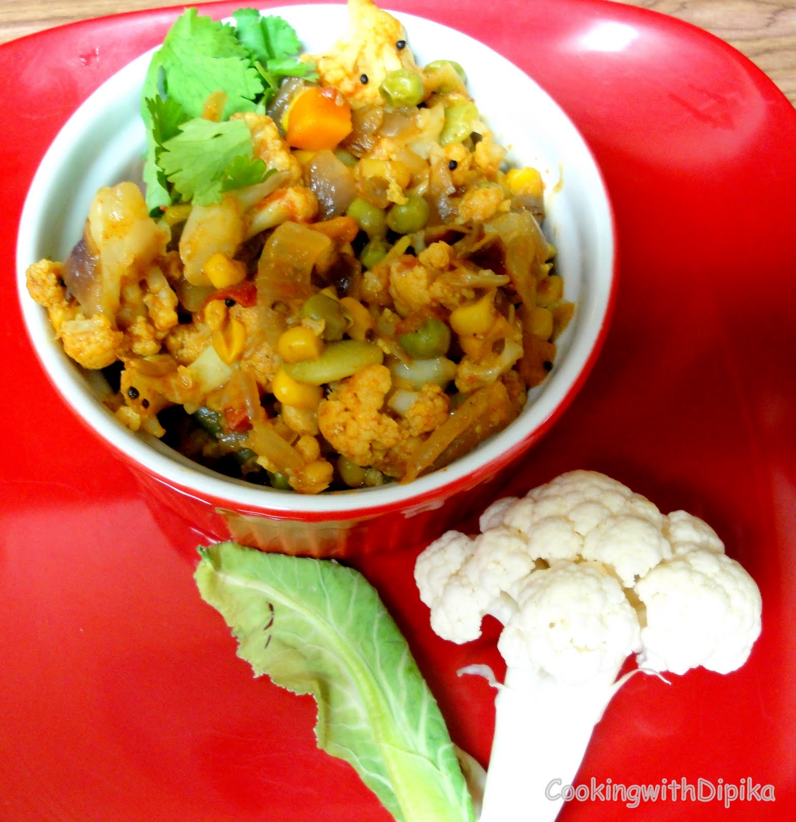 Cooking with Dipika: Cauliflower curry with colorful toppings