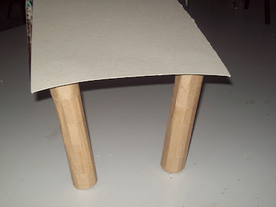 Amanda's BTEC art level 3: view of cardboard leg rest and legs
