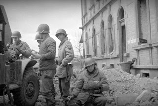 going through the attic: Mannheim, Germany: First Stop, April, 1945