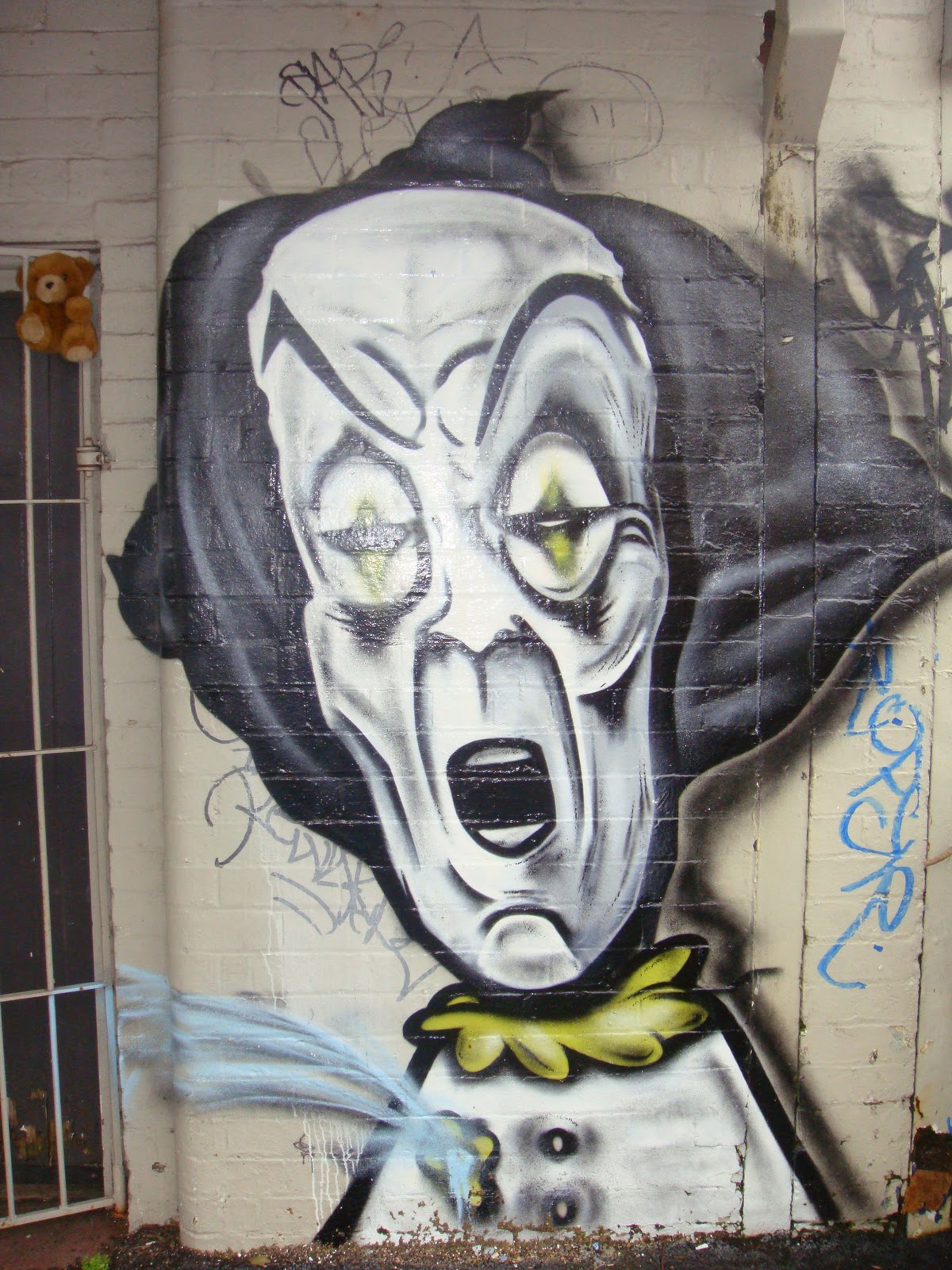 faces and heads two. Melbourne 2010 - LAND OF SUNSHINE