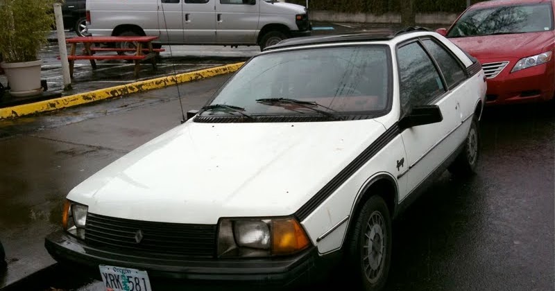 OLD PARKED CARS.: 1983 Renault Fuego Hatchback.