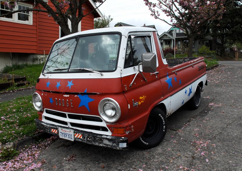 OLD PARKED CARS.: 1967 Dodge A100 Truck.