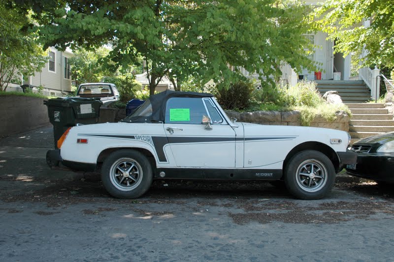 OLD PARKED CARS.: 1976 MG Midget 1500 Special.