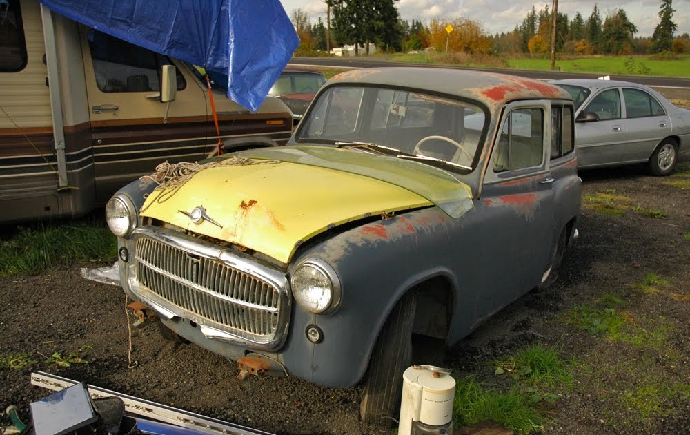 OLD PARKED CARS.: 1954 Hillman Husky.