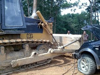 mining engineering: Dozer VS Ford Ranger