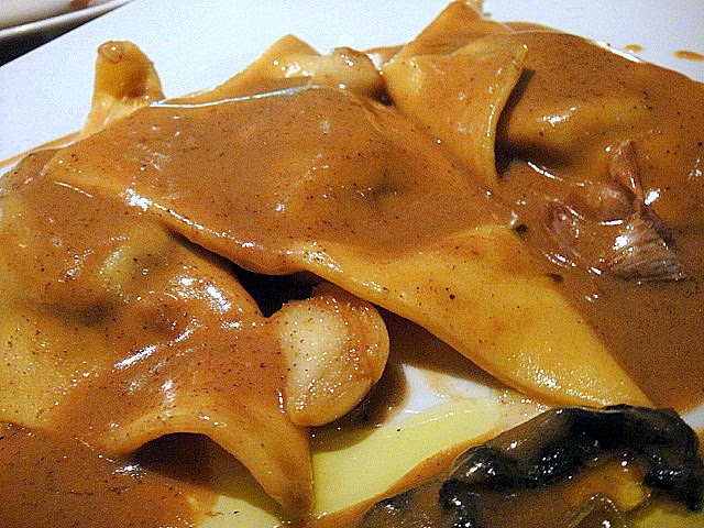 Braised beef cheek ravioli with porcini mushrooms. The ravioli skin ...