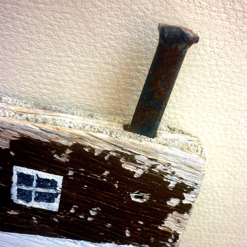 sixty one A: Rusty nail chimney pots and a red boat