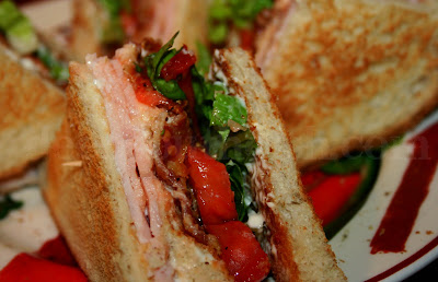 Deep South Dish: Classic Turkey Club Sandwich with Cajun Mayonnaise