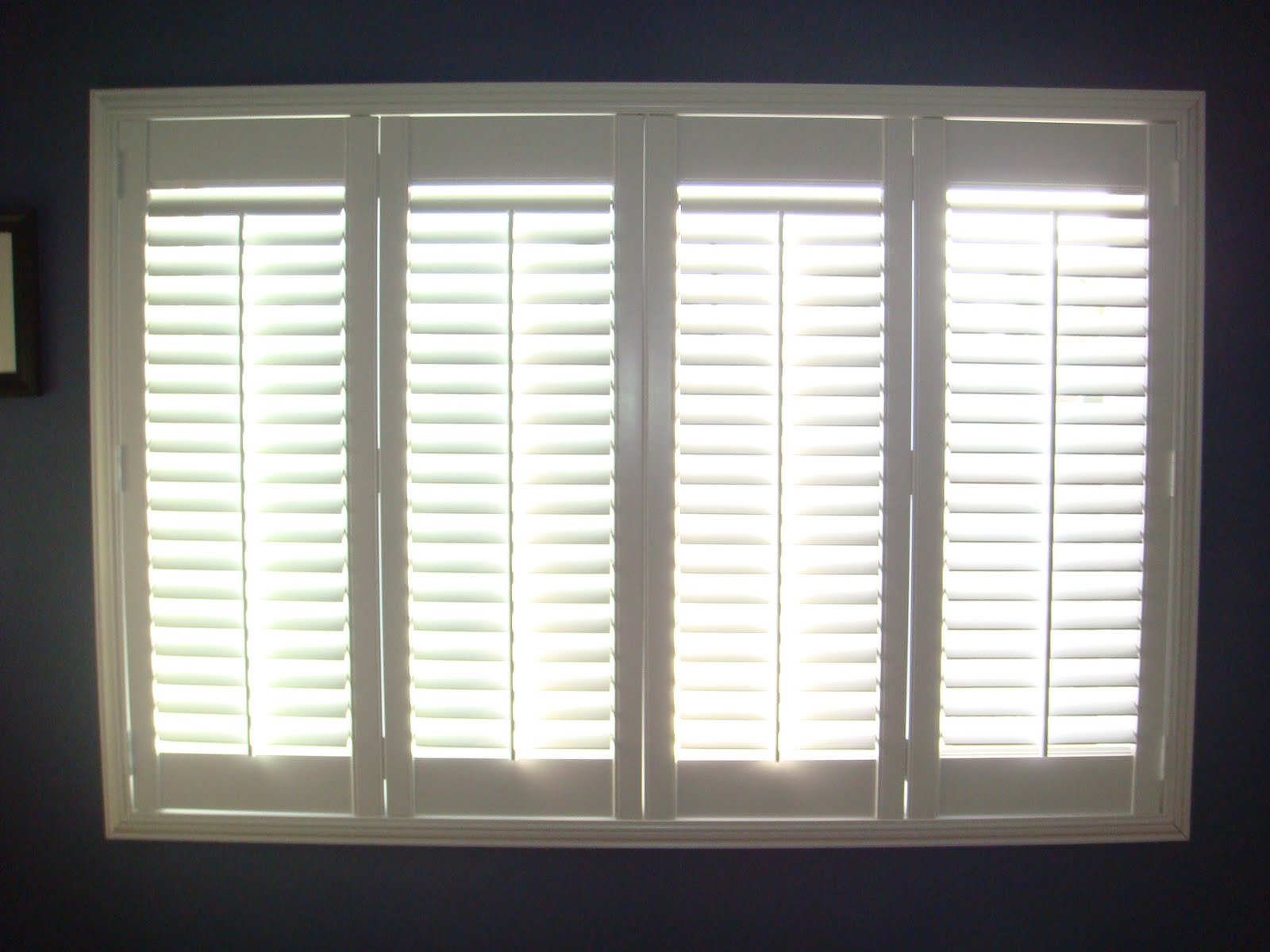 Sunset Blinds: 4 Panel/4 sided Frame Woodwind Shutter by Comfortex