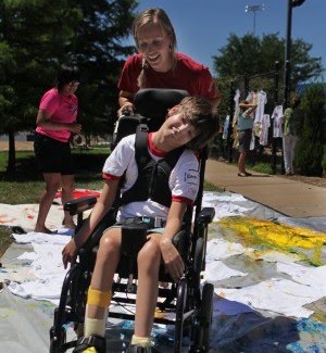 Media dis&dat: Wheelchairs art tools at camp for kids with CP in St. Louis