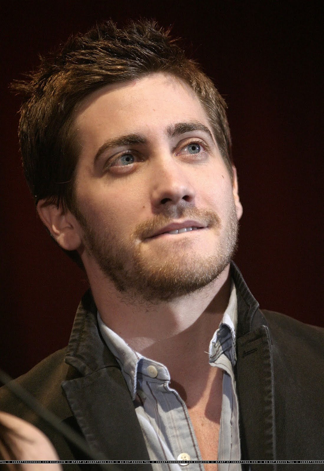 WEIRDLAND: Jake Gyllenhaal pressing lips on his way to London hotel