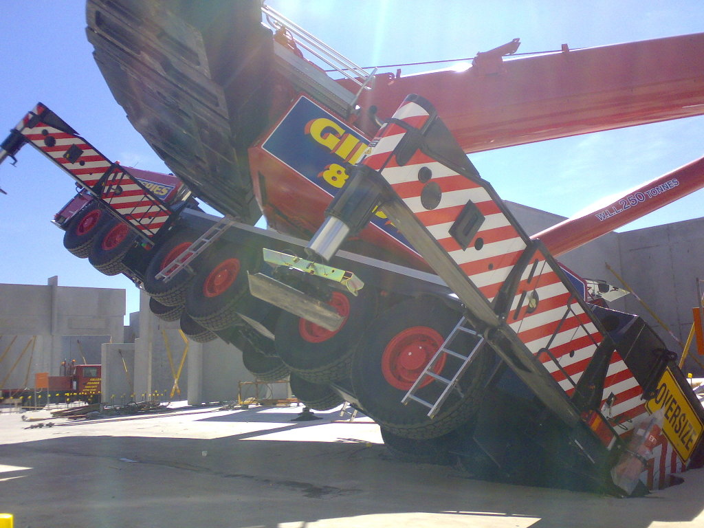 Industry Mayhem: Crane Through Concrete