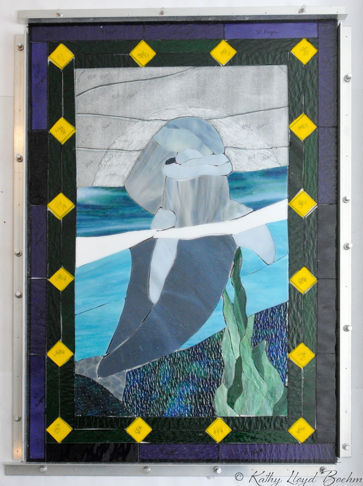 Boehm Stained Glass Blog: Dolphin and Manatee window glass is cut