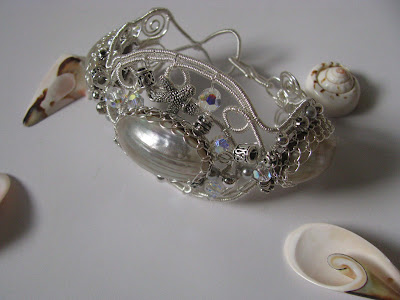 Heri's jewels: Shell bangle and necklaces