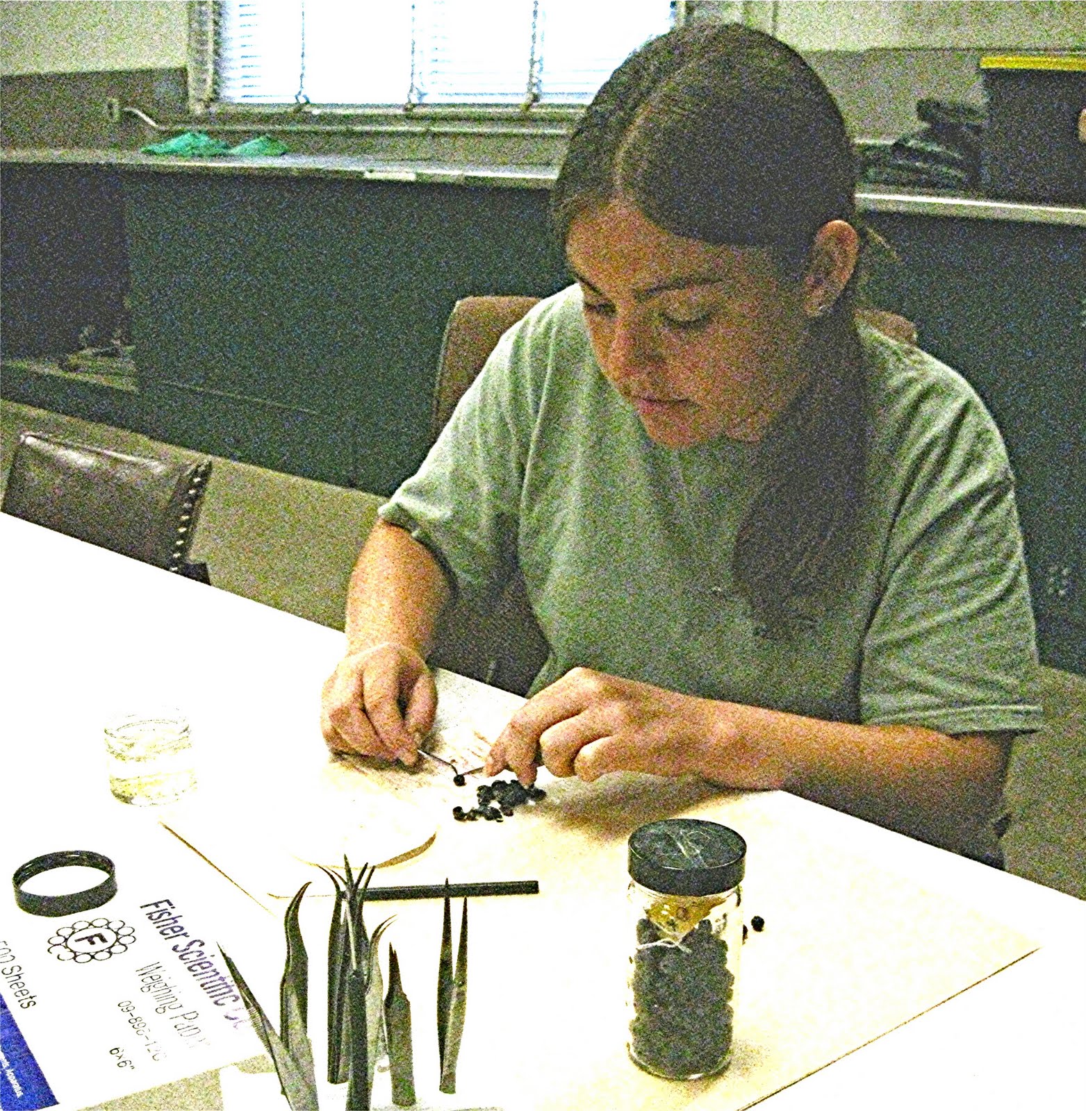 1003 Gardens: Research Intern Tera Roach patiently removing Box ...
