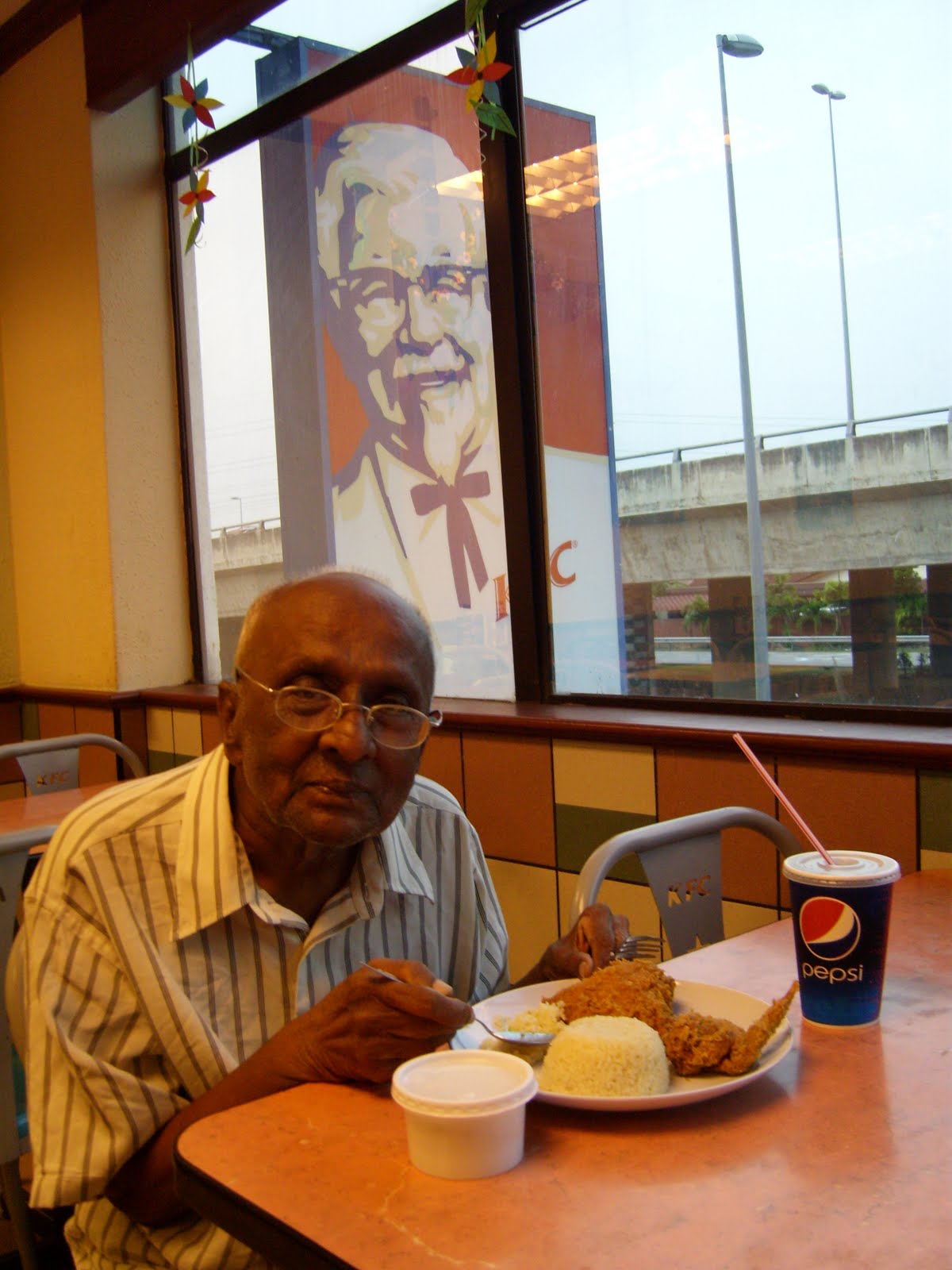 Michan Petite: Uncle Seelan At KFC