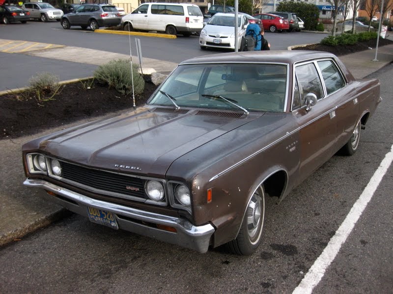 OLD PARKED CARS.: 1968 AMC Rebel SST.