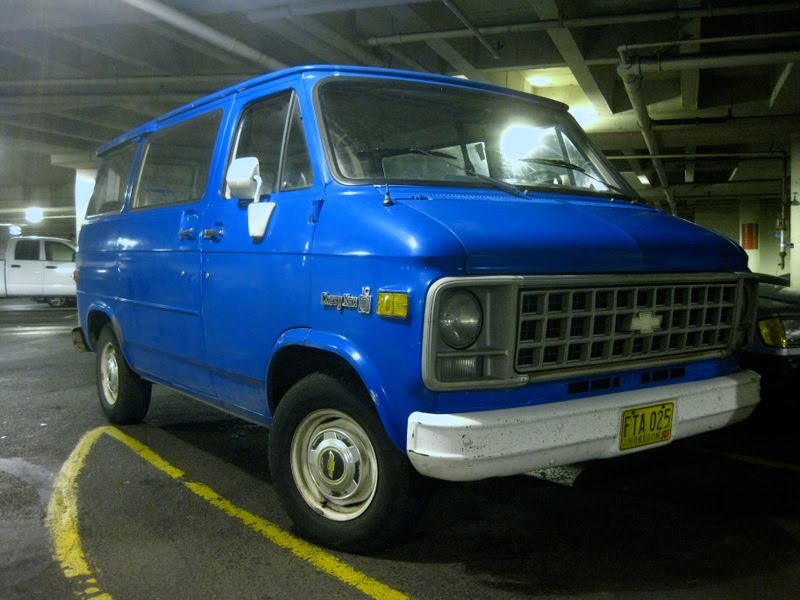 OLD PARKED CARS.: 1980 Chevrolet G10 Van.