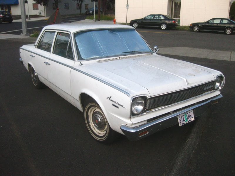 OLD PARKED CARS.: 1966 Rambler American 440 Sedan.