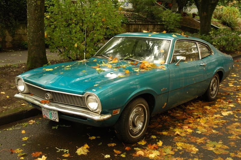 OLD PARKED CARS.: #1 of 2: 1970 Ford Maverick Fastback.