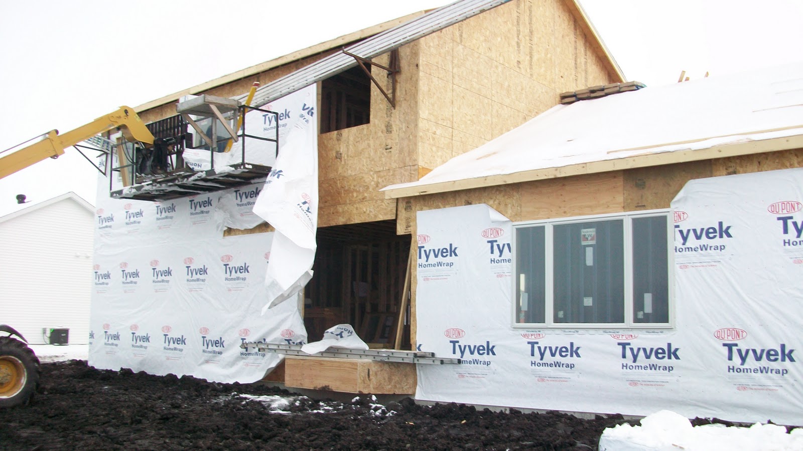 Swenson Home Build: Windows, Backyard Backfill, Tyvek Wrap