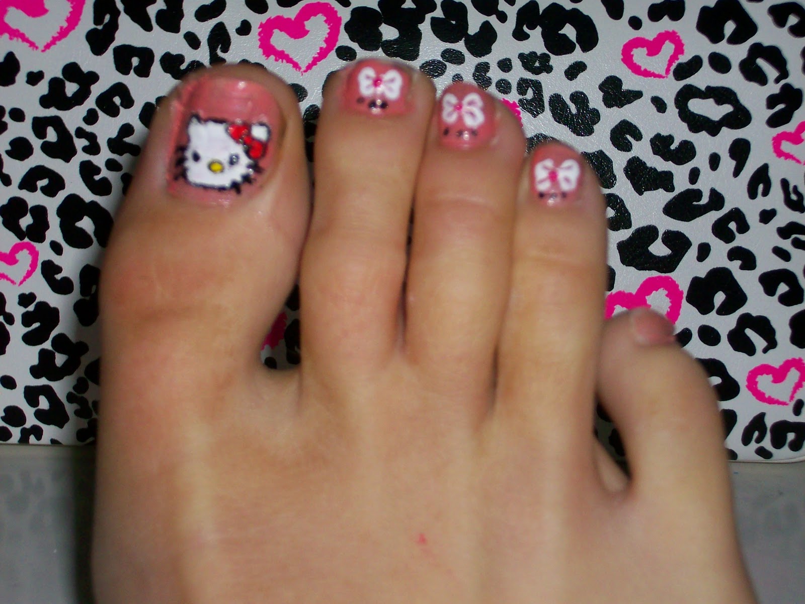 If you can dream it - you can do it.: Hello Kitty nail art.