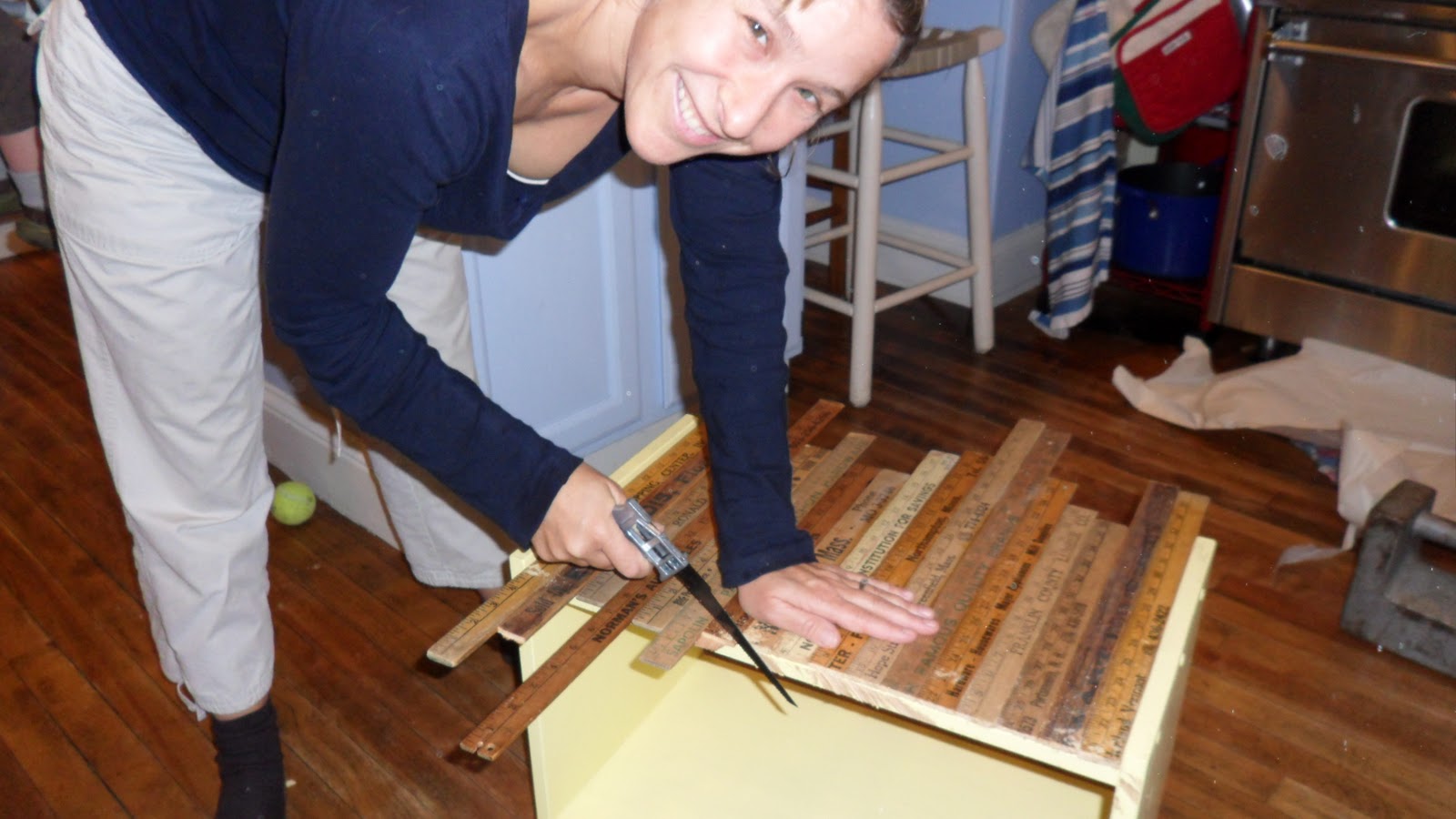 reclaimed crafts: vintage yardsticks + old Ikea table = funky, cool table