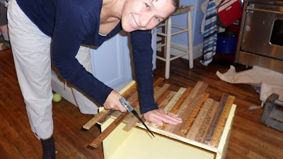 reclaimed crafts: vintage yardsticks + old Ikea table = funky, cool table