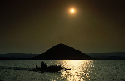Canoe Leaving Volcano Island
