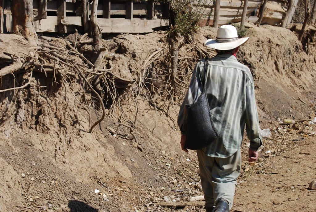 FinngalFotos: Man walking the dusty road in rural Mexico
