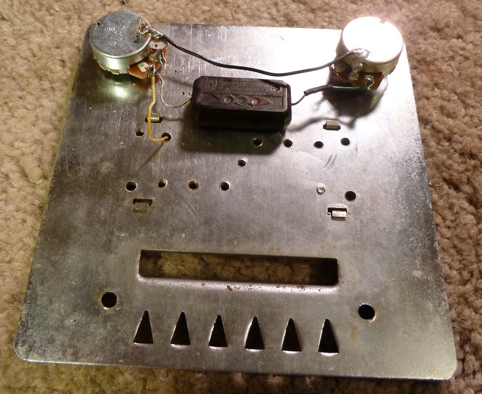 Daily Guitar Repair: Rewinding a Supro "string through" pickup.