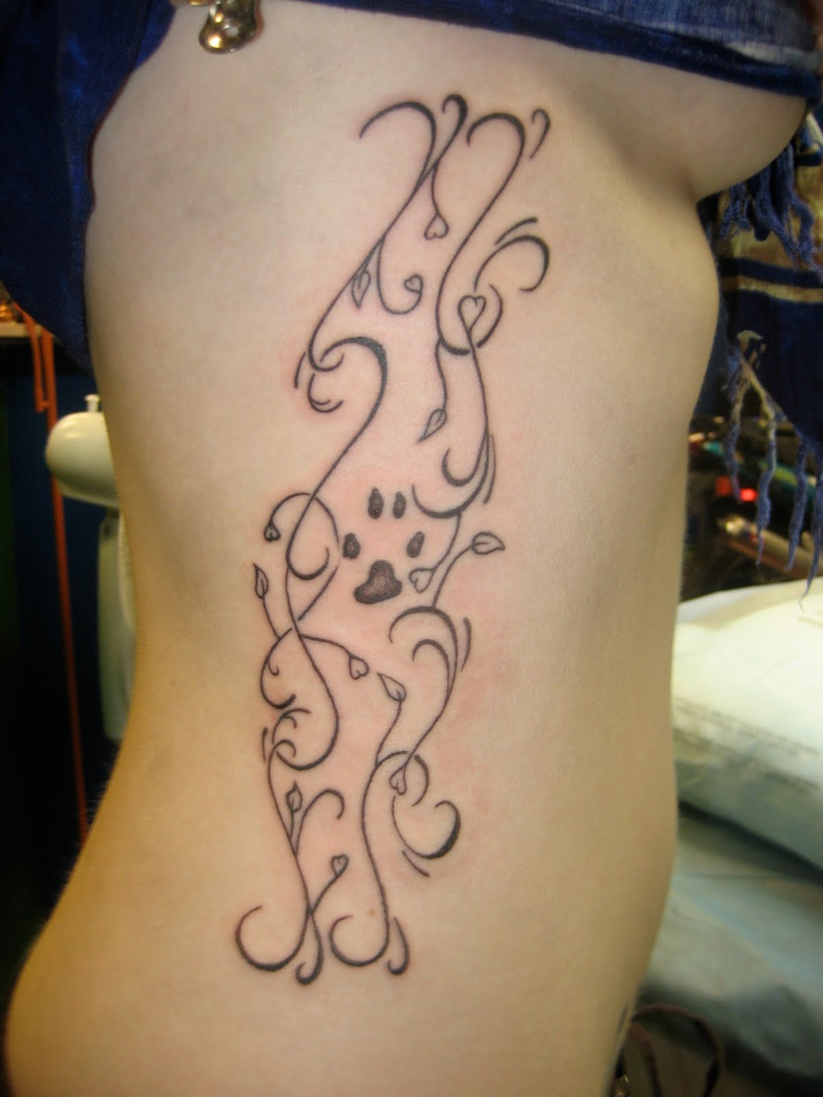 Eric's Tattoos @ EVILUTION TATTOOS Las Vegas NV: Vines with cat paw print