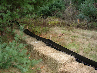 J&S_McClure: Tree Cutter and Hay Bales/Silt fence brought in