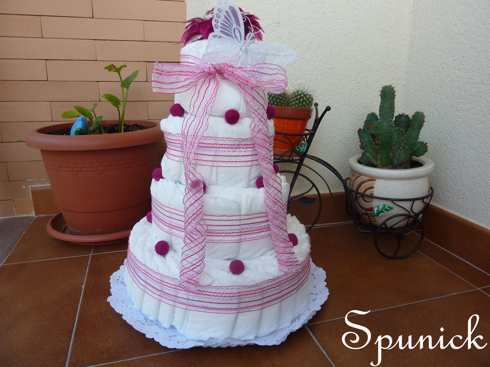 Como hacer una tarta con pañales - Imagui