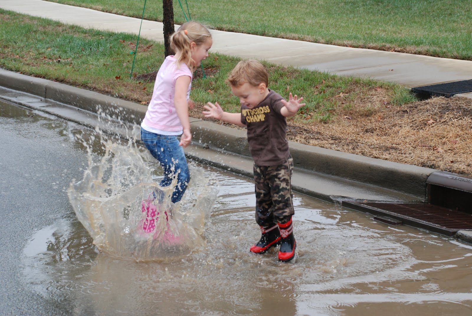The Karaffa Family: jumpin' in the rain puddles