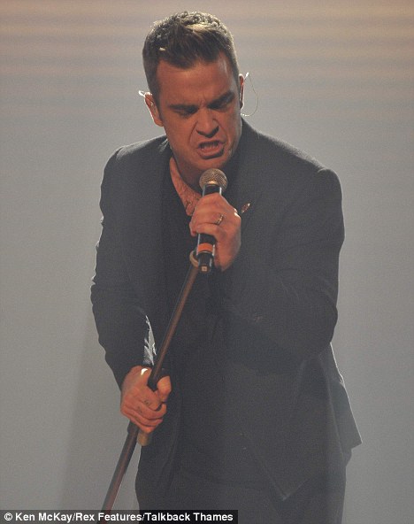 Galleries Magazine: Robbie Williams cements Take That return with group ...